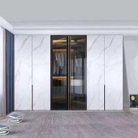 China Luxury Bedroom Wardrobe In Organge Color Door With Led Lighting for sale