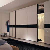 China Luxury Bedroom Wardrobe In Organge Color Door With Led Lighting for sale