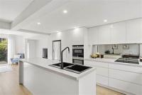 China Modern Modular Kitchen Cabinet White L Shape Kitchen Design With Quartz Stone Top for sale