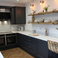 China 2m HPL High Gloss Pvc Kitchen Cabinets With Drawer Contrasting Countertops And Island for sale