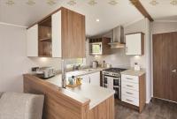 China Wood kitchen cabinets set from Guangdong supplier modern cuisine complete design with quartz stone top and drawers for sale