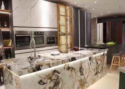 China Modern Modular Kitchen Cabinets In Wood Finish Black Stone Countertop With Fireplace And Sink for sale