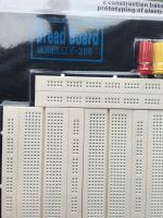 China Big Size White Round Hole Breadboard Spring Clip Surface Finishing 4 Cushions for sale