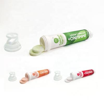 China Customize Plastic Effervescent Tablet Tubes with Desiccant Cover and Customized Color for sale