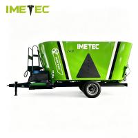 China IMETEC Vertical Auger TMR Mixer with Stainless Steel Construction and Hydraulic Unloading Door for Dairy & Beef Farms for sale