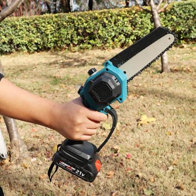China Portable 6 Inch Lithium Cordless Chainsaw With Oil Pump Battery Electric Mini Chainsaw For Clean Cutting for sale