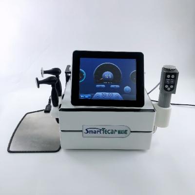 China Portable Multifunction Tecar Therapy Machine with EMS Shockwave 300W RF 300-450kHz for sale