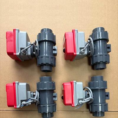 China SONGO UPVC electric reset ball valve thread socket type 220VAC 24VDC with manual operation Pn10 IP67 Plastic actuator normal close for sale