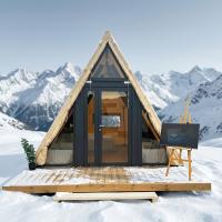 China Luxurious Triangle Shape Wooden Prefab Villa Stable Steel Skeleton Premium Accommodation for Holiday Tourism Resorts for sale
