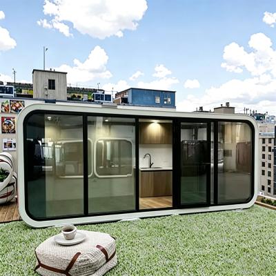 China Steel Frame Apple Container House With Wood Grain Paneling and Full Height Glass for Office or Retail Space for sale