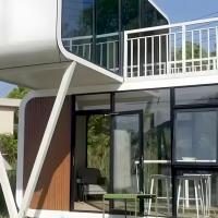 China Modern Energy-Saving Container House Waterproof Prefabricated Tiny Home for Hotels Apple Prefab Houses with Steel Materials for sale