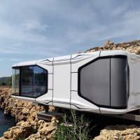 China Modern Design Portable Restaurant Prefabricated Steel Container House with Panoramic Space Capsule Vessel House for sale
