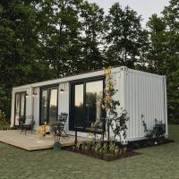 China Guangdong Foshan Prefabricated Commercial Luxury Modular Tiny Home apple Cabin 2 Bedroom Space Capsule House with Kitchen for sale