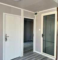 China Steel Modified Shipping Container House Flat Pack Container for Office Living Room Workshop Use Potable House for sale