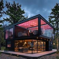 China Container House Flat Pack Office School Living Room Bedroom Apartment Durable Sandwich Panel Steel Material Versatile Use for sale