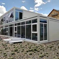 China Modular Tiny  House  Prefab Flat Pack Shipping Container House  Hotel Mobile Room Made Steel Frame Sandwich Office Shop Workshop for sale