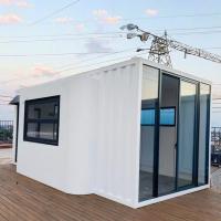 China Modular Tiny  House  Prefab Flat Pack Shipping Container House  Hotel Mobile Room Made Steel Frame Sandwich Office Shop Workshop for sale