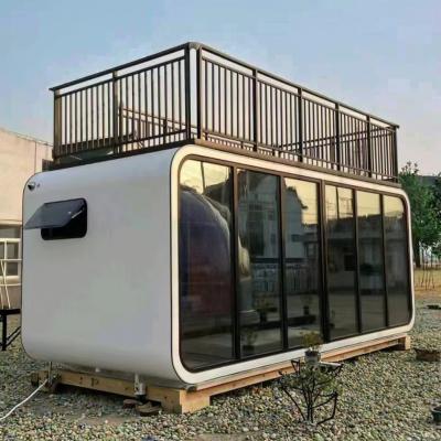 China Easy Flat-Pack Assembly Prefab Tiny Cabin Steel Structure Sandwich Panel Greenhouse with Bird Apple Container House Growth Cabin for sale