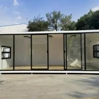 China Easy Flat-Pack Assembly Prefab Tiny Cabin Steel Structure Sandwich Panel Greenhouse with Bird Apple Container House Growth Cabin for sale