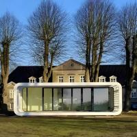China Luxury Modular Steel Container House Waterproof Prefab Apple Cabin for Creative Studio or Office Use Tiny Homes for sale