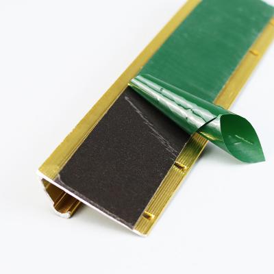 China Gold Aluminum Carpet Edging Strip 36.8mm with Adhesive Nail for Tile Floor Trim for sale