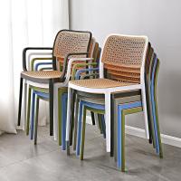 China Modern Stackable Plastic Dining Chair Rattan Design Armrest for sale