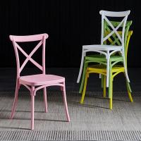 China Modern PP Plastic Dining Chair X Cross Back Stackable Custom Colors for sale