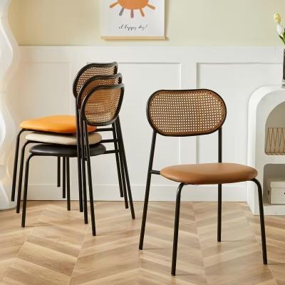 China Modern Rattan Back Dining Chair with Metal Frame and PU Seat for sale
