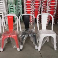 China Modern Iron Dining Chair Orange Powder Coated Stackable Bistro for sale