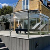 China 10mm 12mm Frameless Glass Balustrade with Spigots - Tempered Safety Glass for Balcony and Staircase Railings for sale