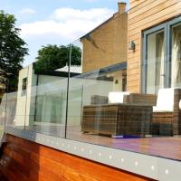 China Frameless Deck Glass Railing 4+4mm to 8+8mm Outdoor Tempered Laminated Balustrade System for sale