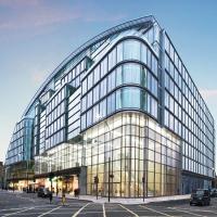 China 4mm-12mm Reflective Glass Curtain Wall System with 34dB Soundproofing and Thermal Insulation for Office Buildings for sale