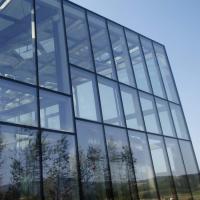 China Low-E Glass Curtain Wall System with 6-12mm Tempered Glass and 27A Air Gap for Commercial Building Energy Efficiency for sale
