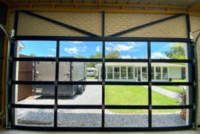 China Single Clear Tempered Glass Garage Door Contemporary Design with Rust-proof Aluminum Frame for sale