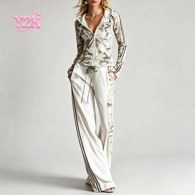 China Custom Women's Camouflage Zip Hoodie Wide Leg Pants Set for sale