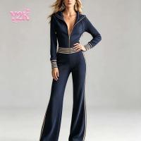 China Custom Women's Ribbed Zip Front Flared Leg Sports Jumpsuit for sale