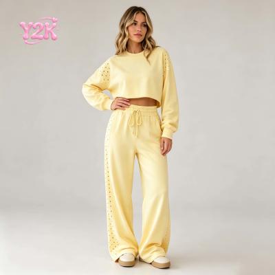 China Custom Women's Eyelet Lace Sweatshirt Wide Leg Pants Set for sale