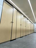 China Wood grain HPL compact laminate toilet partitions with black trim, commercial restroom stall dividers for office building for sale