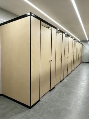 China Wood grain HPL compact laminate toilet partitions with black trim, commercial restroom stall dividers for office building for sale