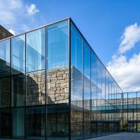 China Hidden Frame Low-E Glass Curtain Wall with Double-Layer Construction for Waterproof Windproof Soundproof Performance for sale