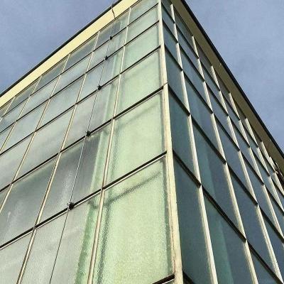 China Standard Plane Frame Curtain Wall System with Double-Layer Tempered Glass for Commercial Buildings for sale