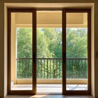 China 80mm Aluminum Folding Door with Wooden Grain Finish - Waterproof & Energy Efficient Design for sale