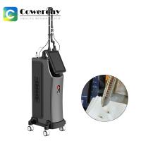 China Guiding Arm Co2 Fractional Laser Dot Matrix Removal Acne Scars Device for sale
