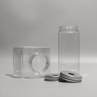 China Customized Color PET Plastic Bottle with Screw On Lid for Beverages for sale