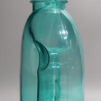 China Ring Shape Empty Plastic PET Bottle 500ml With Screw Lid For Juice Beverage for sale