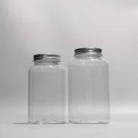 China Custom Capacity Empty PET Bottle Plastic Juice Bottle With Screw On Lid for sale