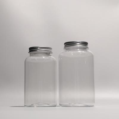 China Custom Capacity Empty PET Bottle Plastic Juice Bottle With Screw On Lid for sale