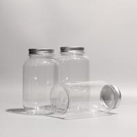 China Custom Capacity Empty PET Bottle Plastic Juice Bottle With Screw On Lid for sale