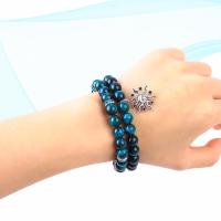 China Handmade Elastic Round Turquoise Blue Tiger'S Eye Stone Beaded Stretch Bracelet for sale