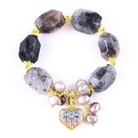 China Handmade Black Rutilated Quartz Bracelet 23cm Adjustable Natural Stone Jewelry with 106g Weight for Daily Wear for sale